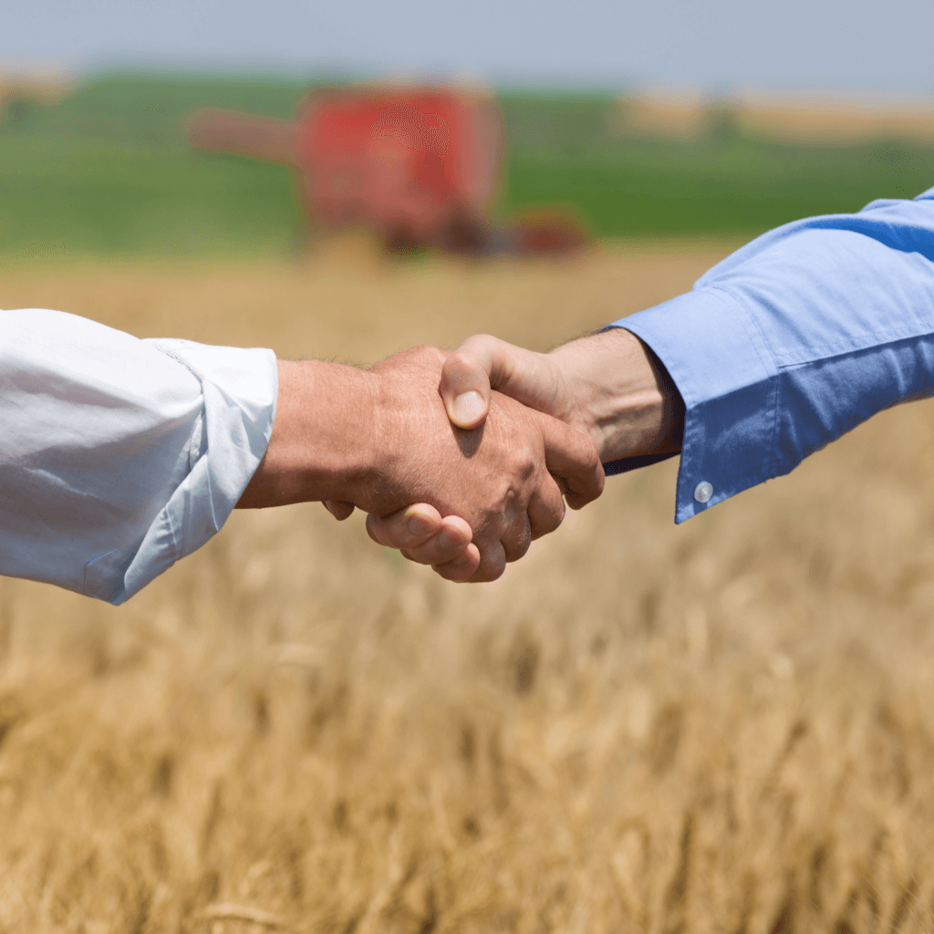 farm-handshake - Standard Grain